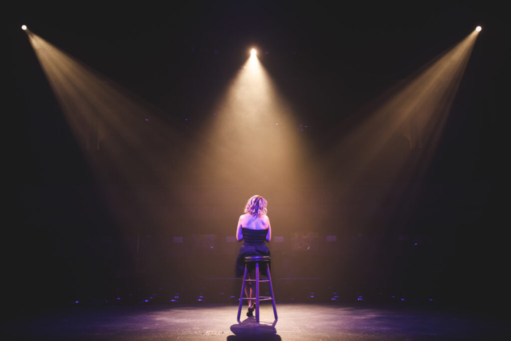 Solo,Performer,On,The,Stage | Vegas Legal Magazine